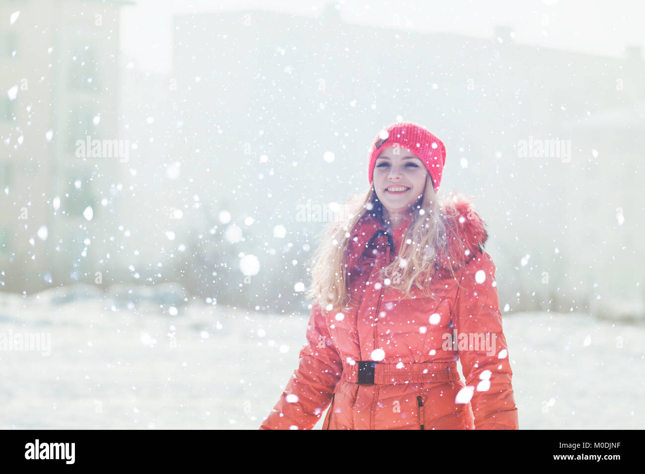 Girl in red parka Stock Photo - Alamy