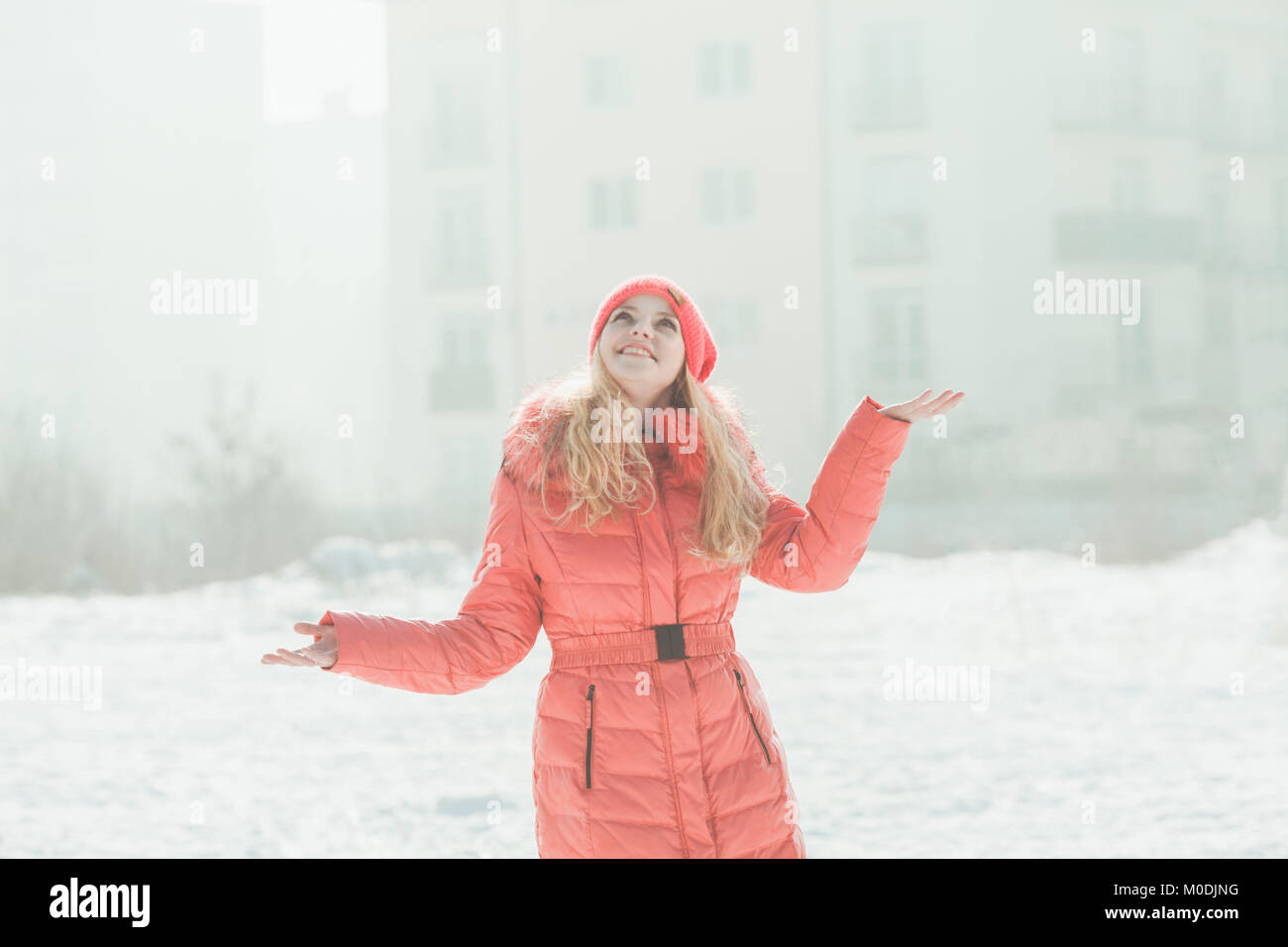 Girl in red parka Stock Photo - Alamy