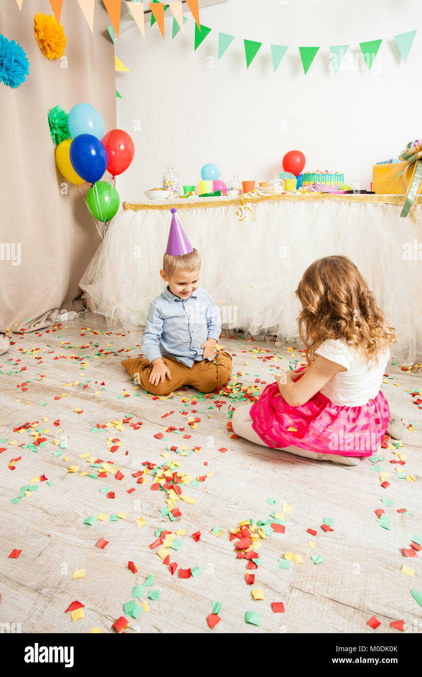 Celebrating birthday party with confetti Stock Photo - Alamy
