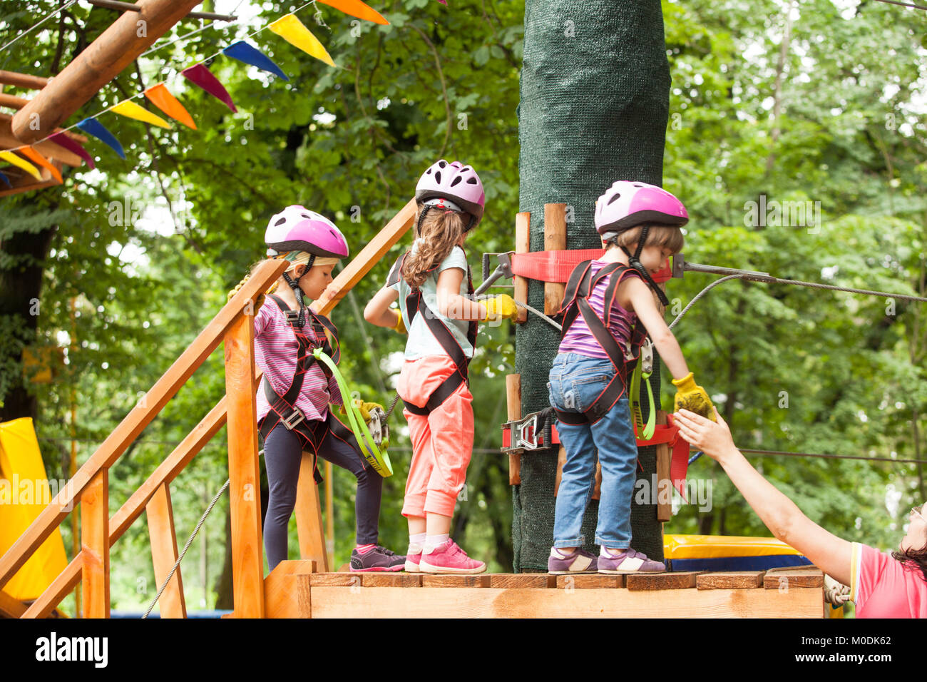 The obstacle course in adventure park Stock Photo - Alamy