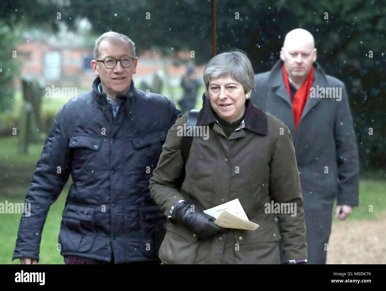 Prime Minister Theresa May and her husband Philip (left) leave after ...