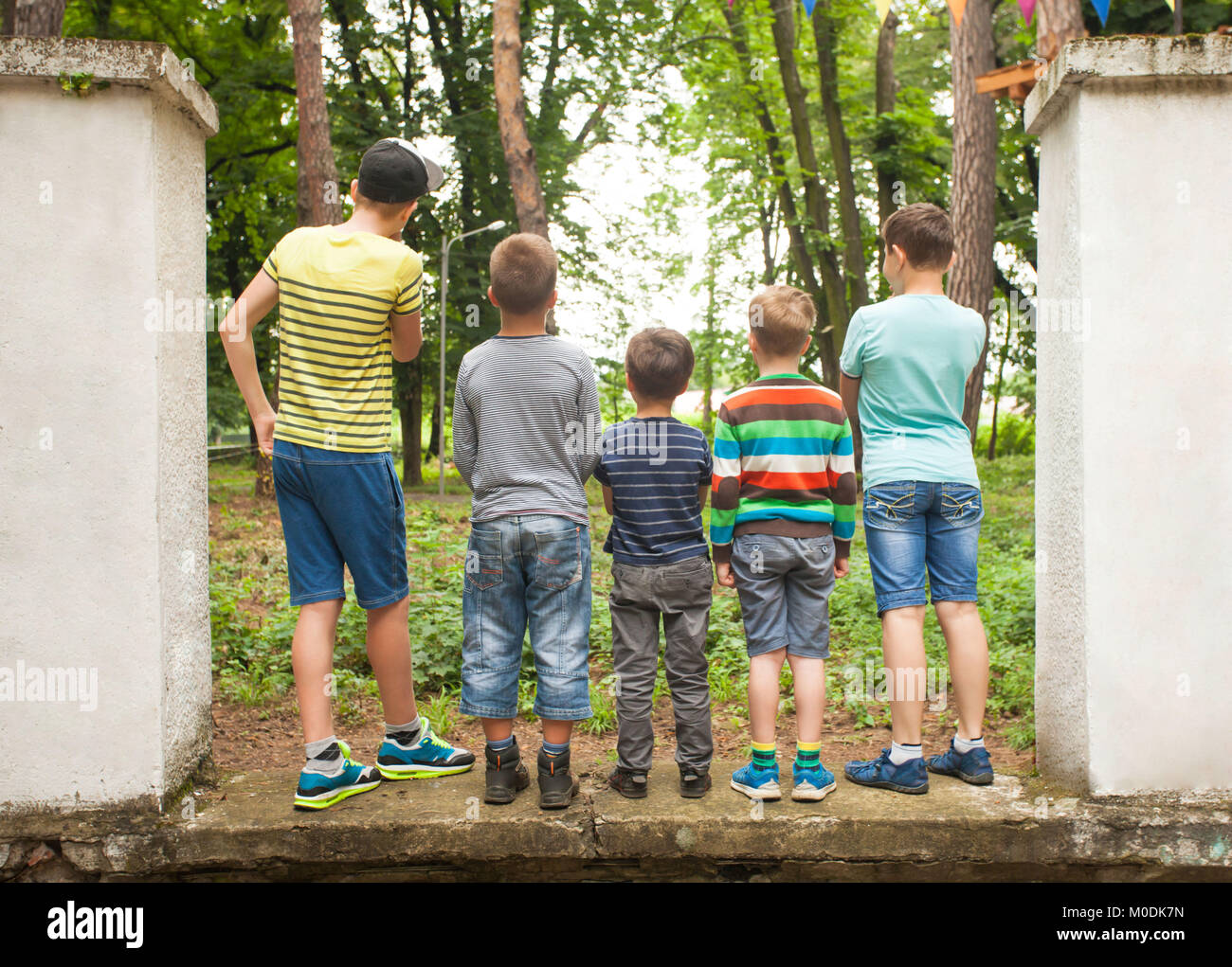 Group of guys in a row back view Stock Photo - Alamy
