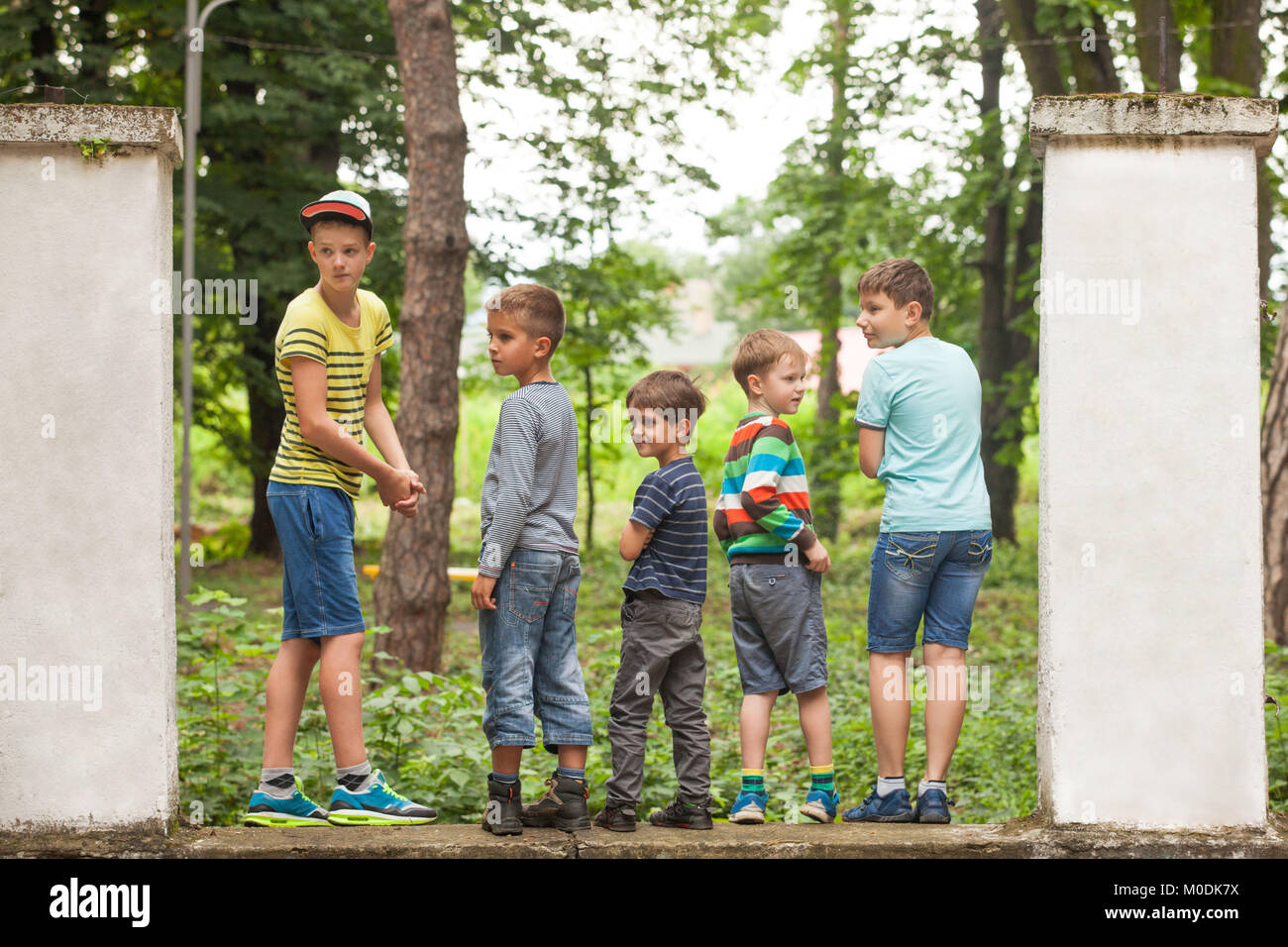 Group of guys in a row back view Stock Photo - Alamy