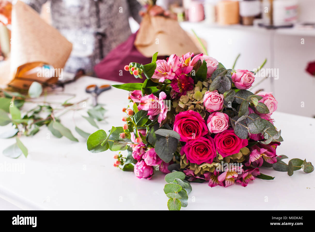 Finished bouquets on the table Stock Photo - Alamy