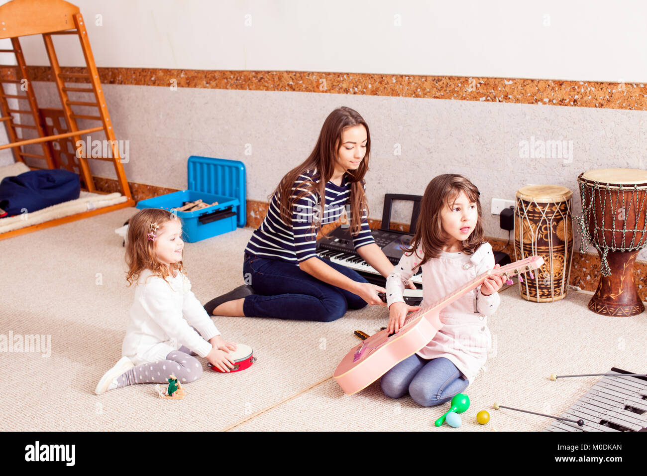 Music making lesson Stock Photo - Alamy