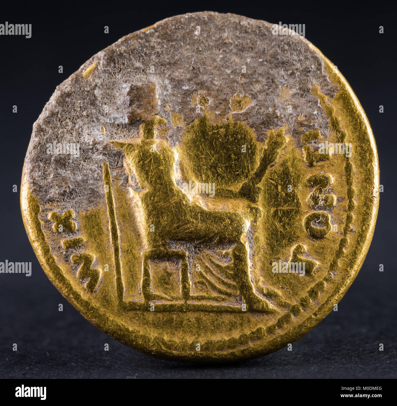 Ancient Roman gold aureus coin of Emperor Tiberius. Reverse Stock Photo ...