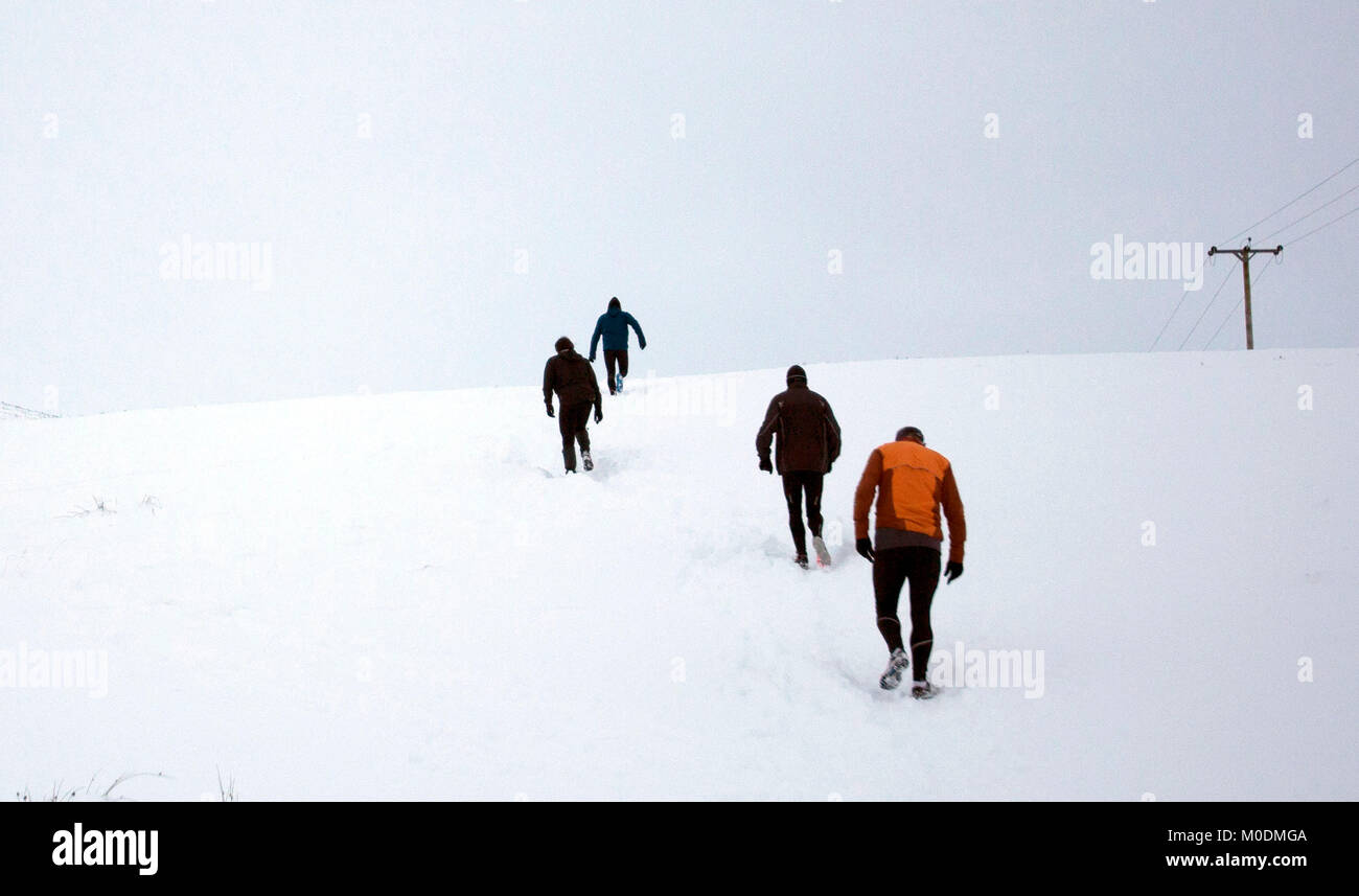 Cross country runners set off through heavy snow around Peebles in the ...