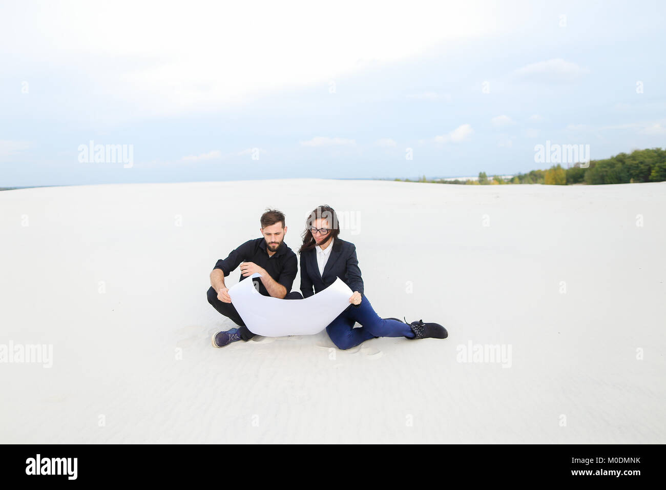 Economists brother and sister planning shopping center in dese Stock ...