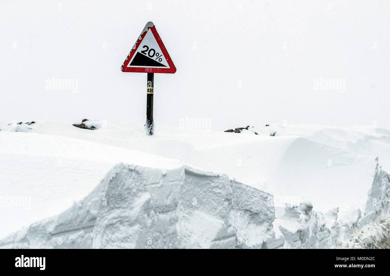 A road sign in deep snow near Fleet Moss in the Yorkshire Dales ...