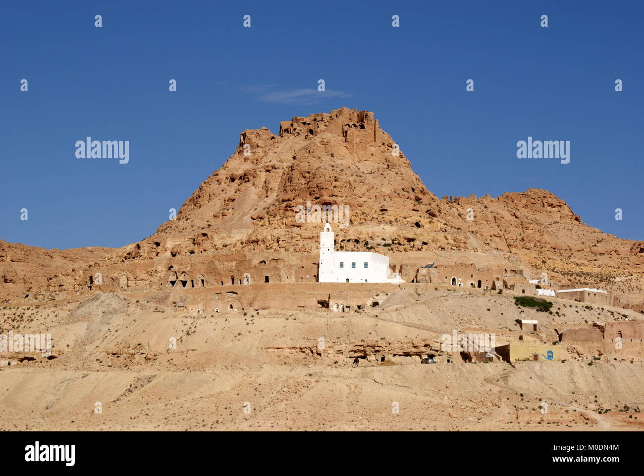 View of the abandoned hilltop Berber village of Douiret and the ...