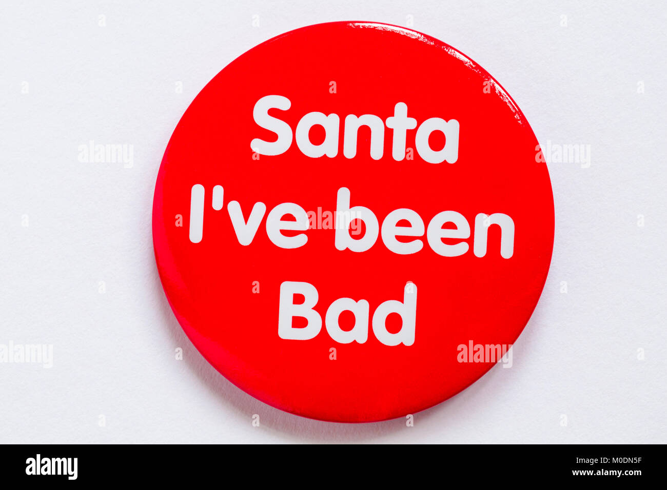 Santa ive been bad pin badge hi-res stock photography and images - Alamy