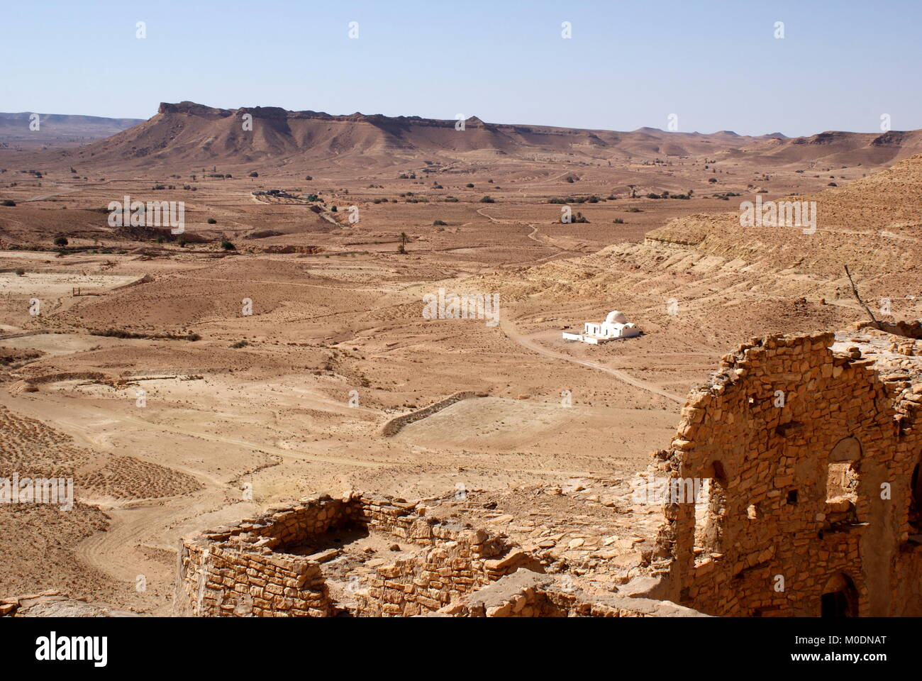 View from the abandoned hilltop Berber village of Douiret of a single ...