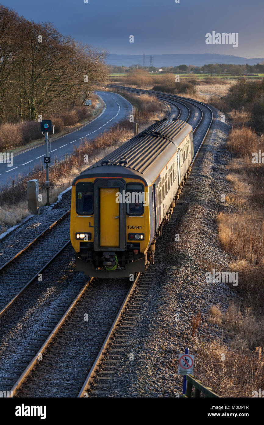 Northern rail class 156 sprinter train passes Teesside Airport with the ...