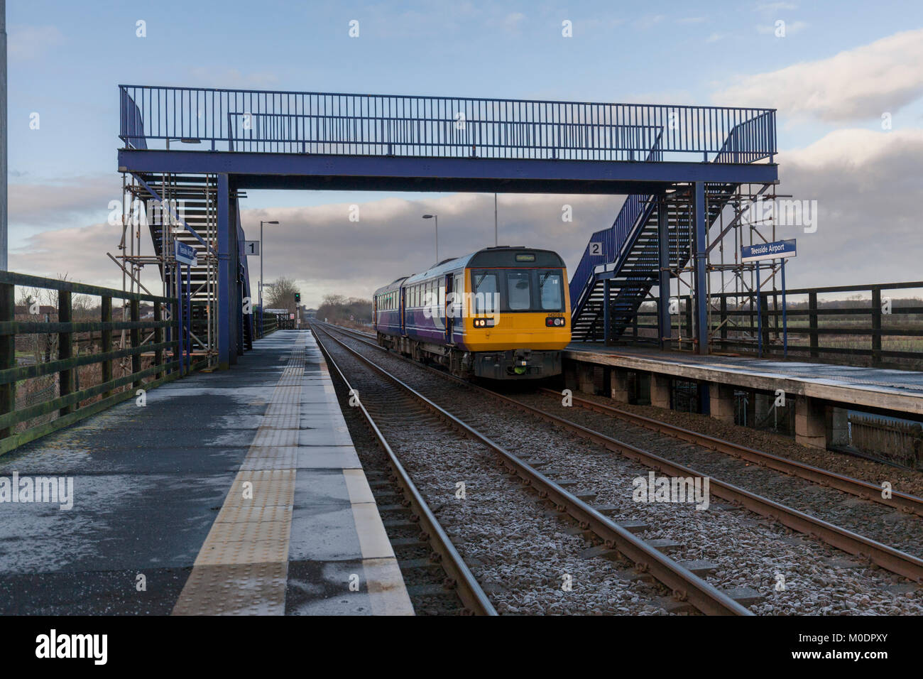 Northern Rail pacer train passing through Teesside Airport station ...