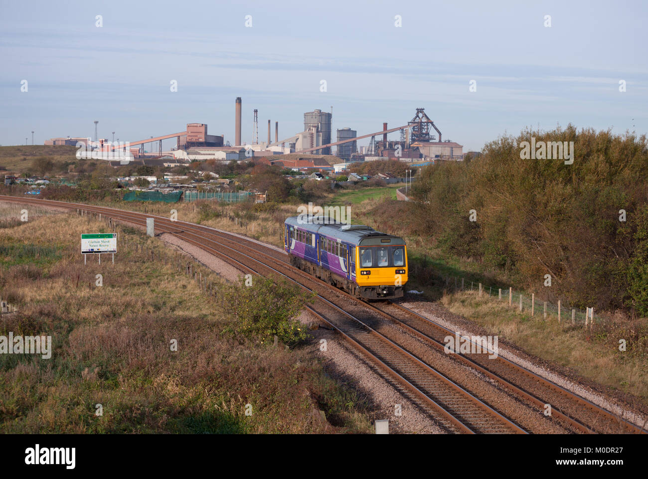 A Northern rail class 142 pacer train passes Coatham Marsh, Redcar ...