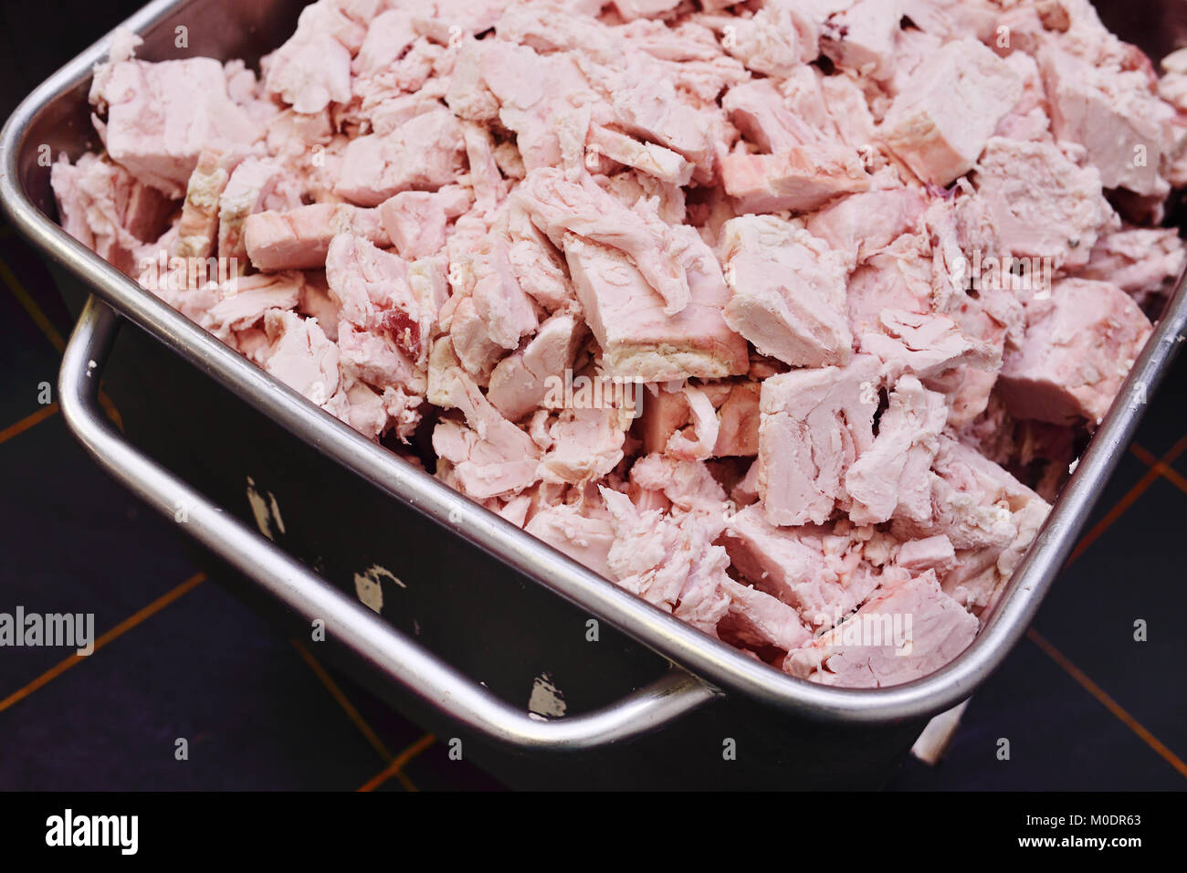 lard, pork or ground beef in metal containers in food production Stock ...