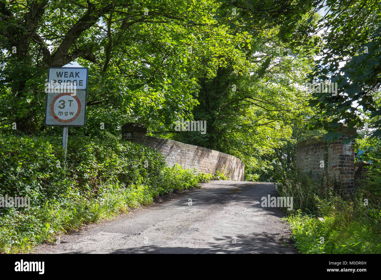 Weak bridge sign with warning of restricted traffic to 3 tonnes in ...