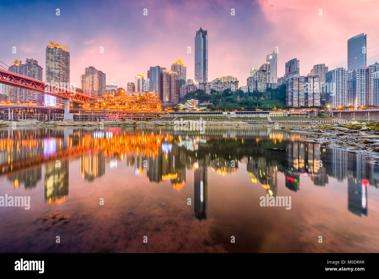 Chongqing, China skyline on the Jialing River at dusk Stock Photo - Alamy