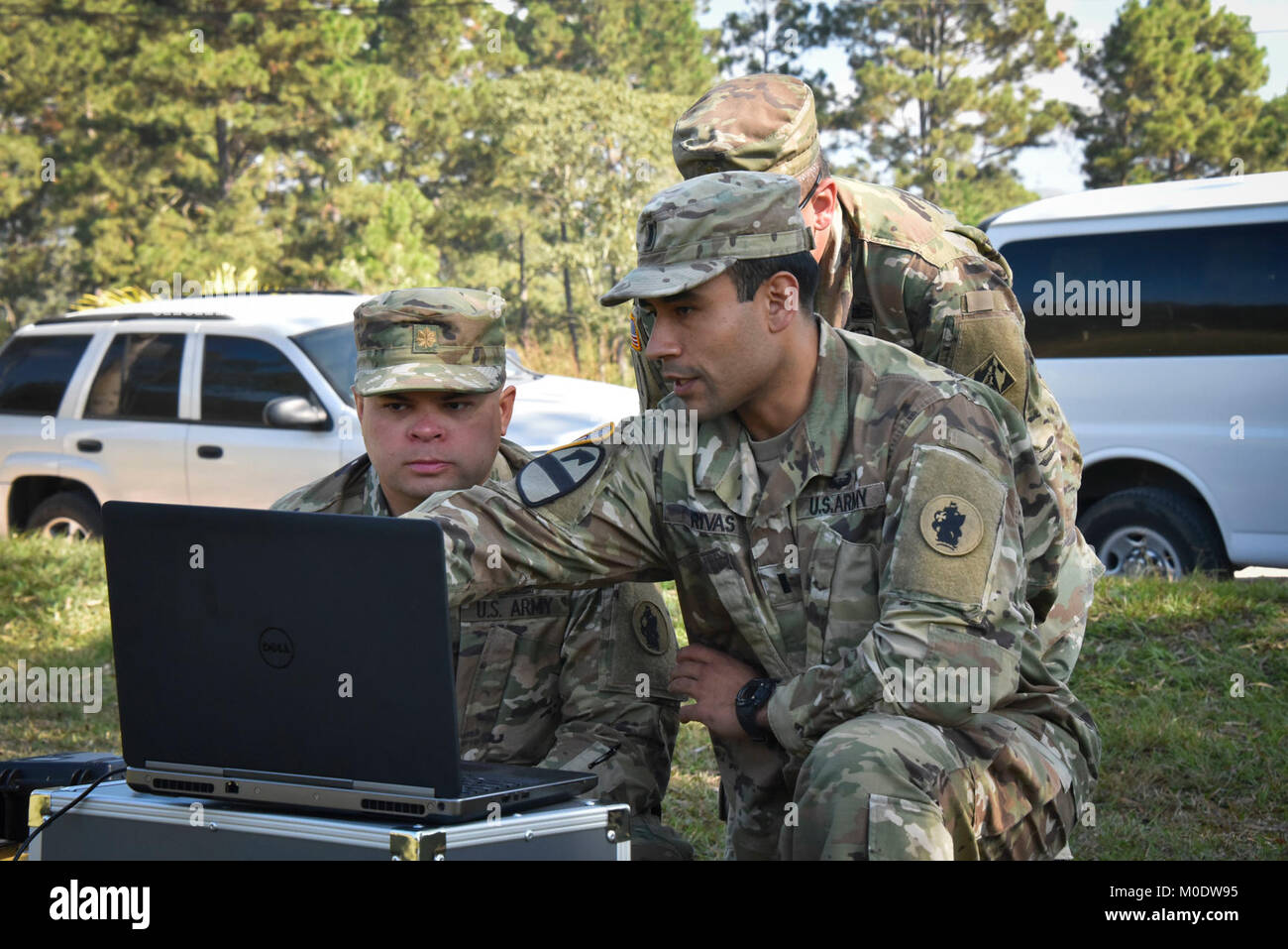 U.S. Army engineers with Joint Task Force-Bravo monitor the associated ...