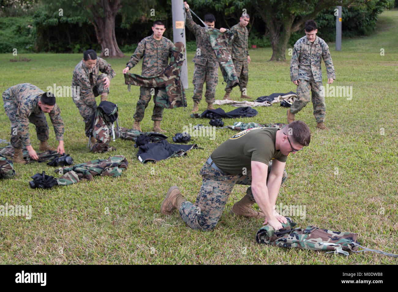 CAMP FOSTER, OKINAWA, Japan – Cpl. RJ Hogrefe show Marines how to ...