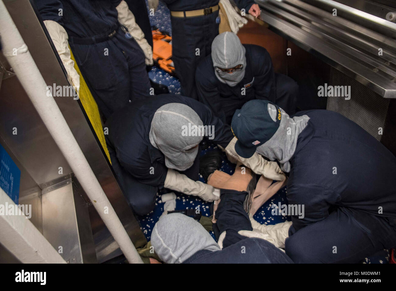 ARABIAN GULF (Jan. 13, 2018) Sailors badge a broken leg during a ...
