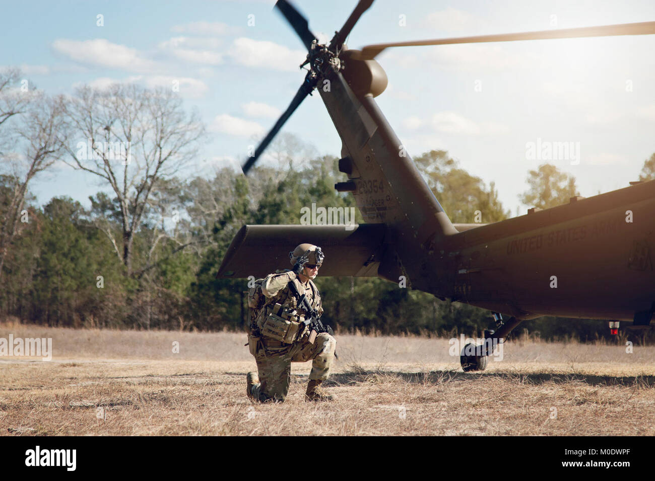 A 1st Security Force Assistance Brigade Soldier conducts a hand and arm ...