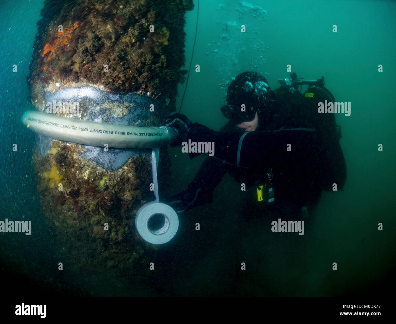 U.S. Navy Chief Steelworker Jesse Hamblin, assigned to Underwater ...