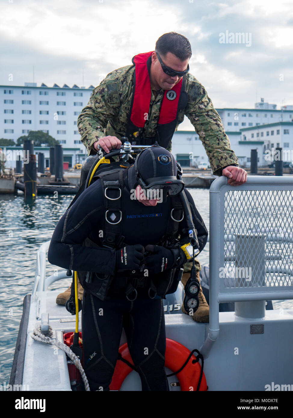 U.S. Navy Construction Mechanic 1st Class Matthew Ramirez, assigned to ...