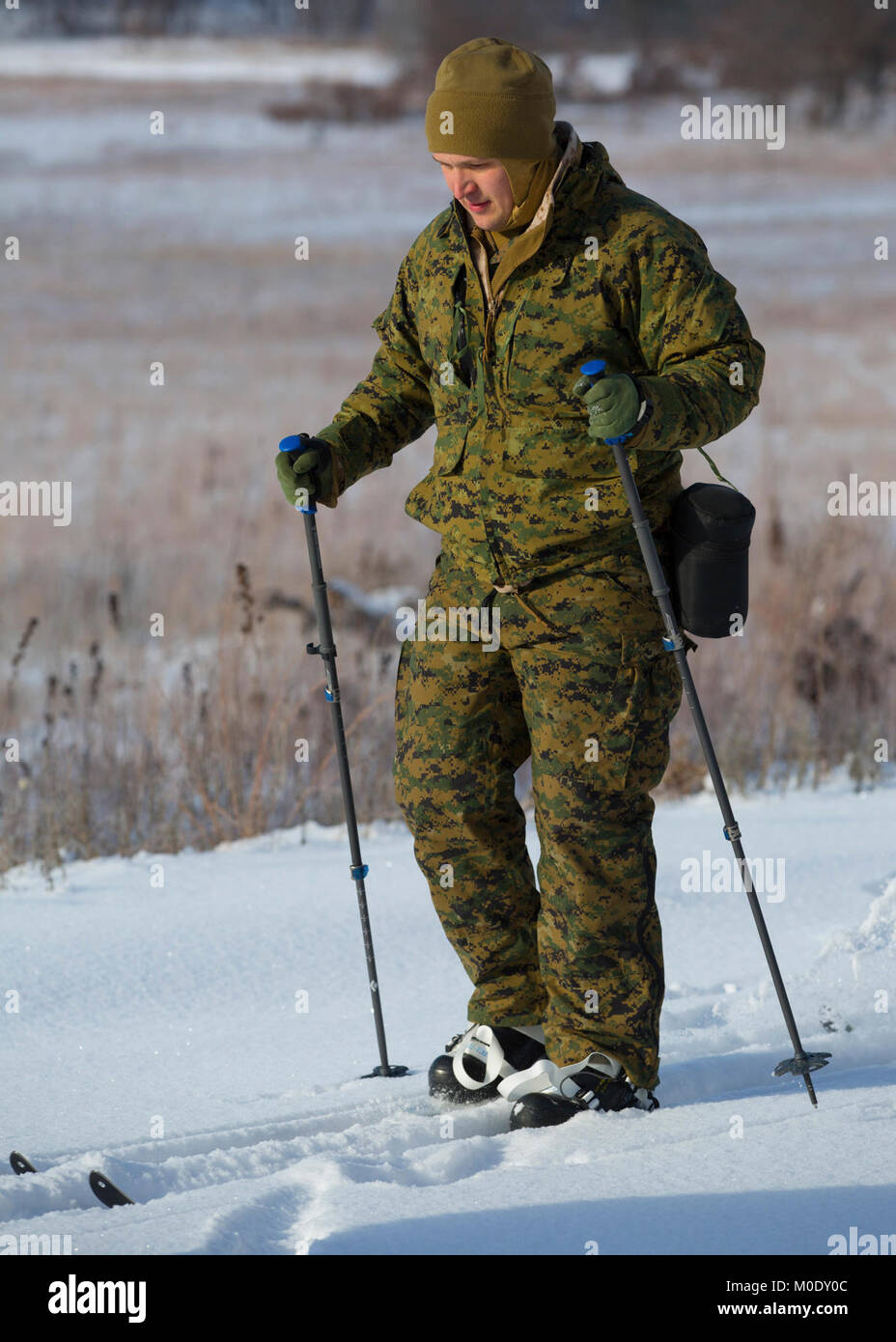 U.S. Marine Corps Sgt. Nicholas Moore, a chemical, biological ...