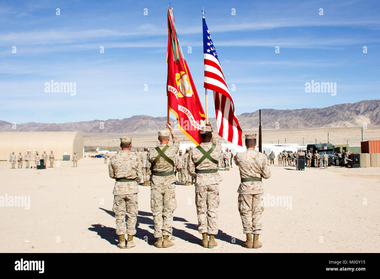 Color guard stands in post and relief ceremony at Camp Wilson aboard ...