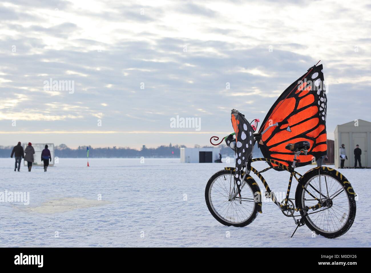 A bicycle with butterfly wings, at the Art Shanty Projects on frozen ...