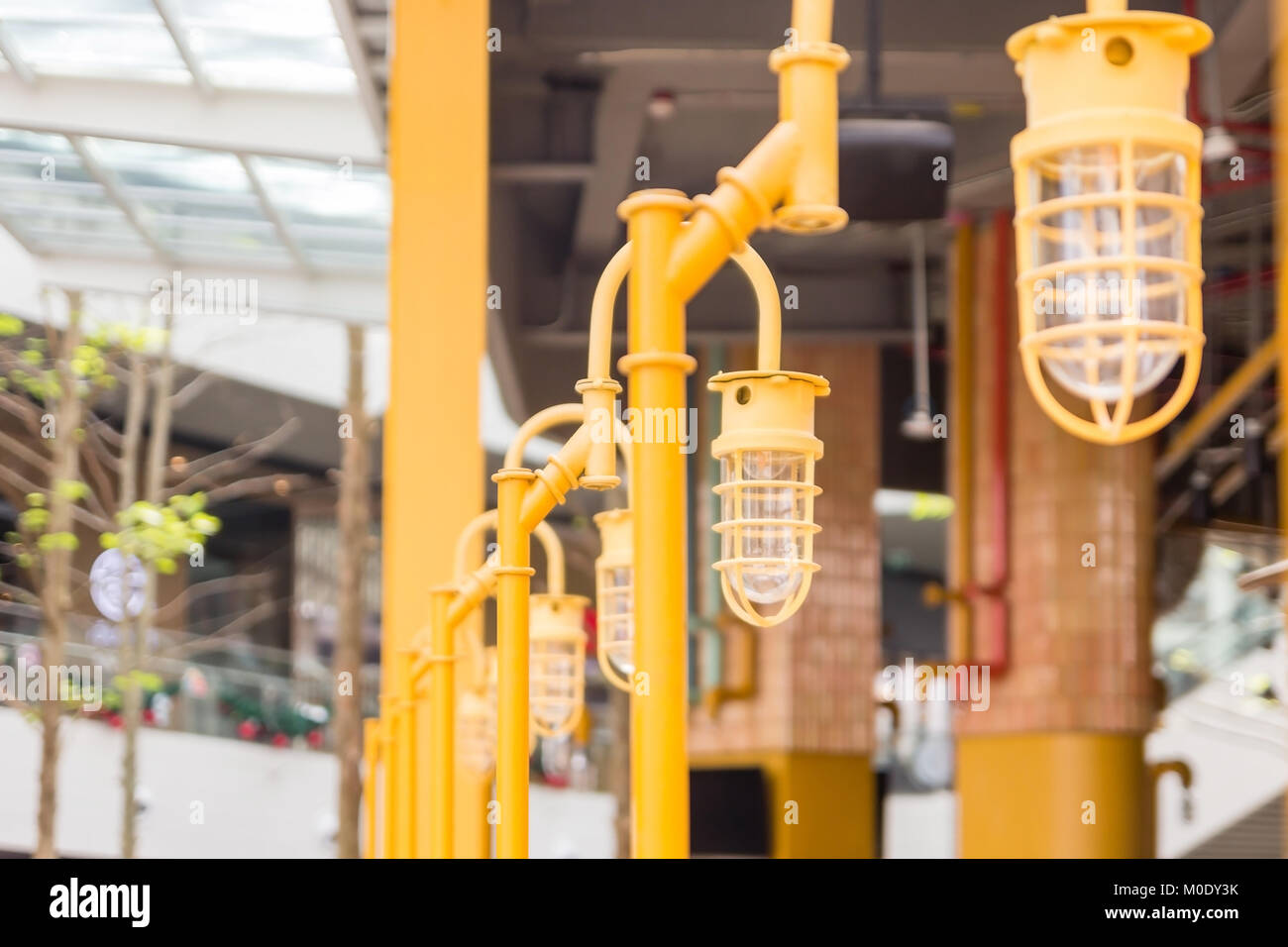 Street lamp pole design with blurred background. Outdoor light pole ...