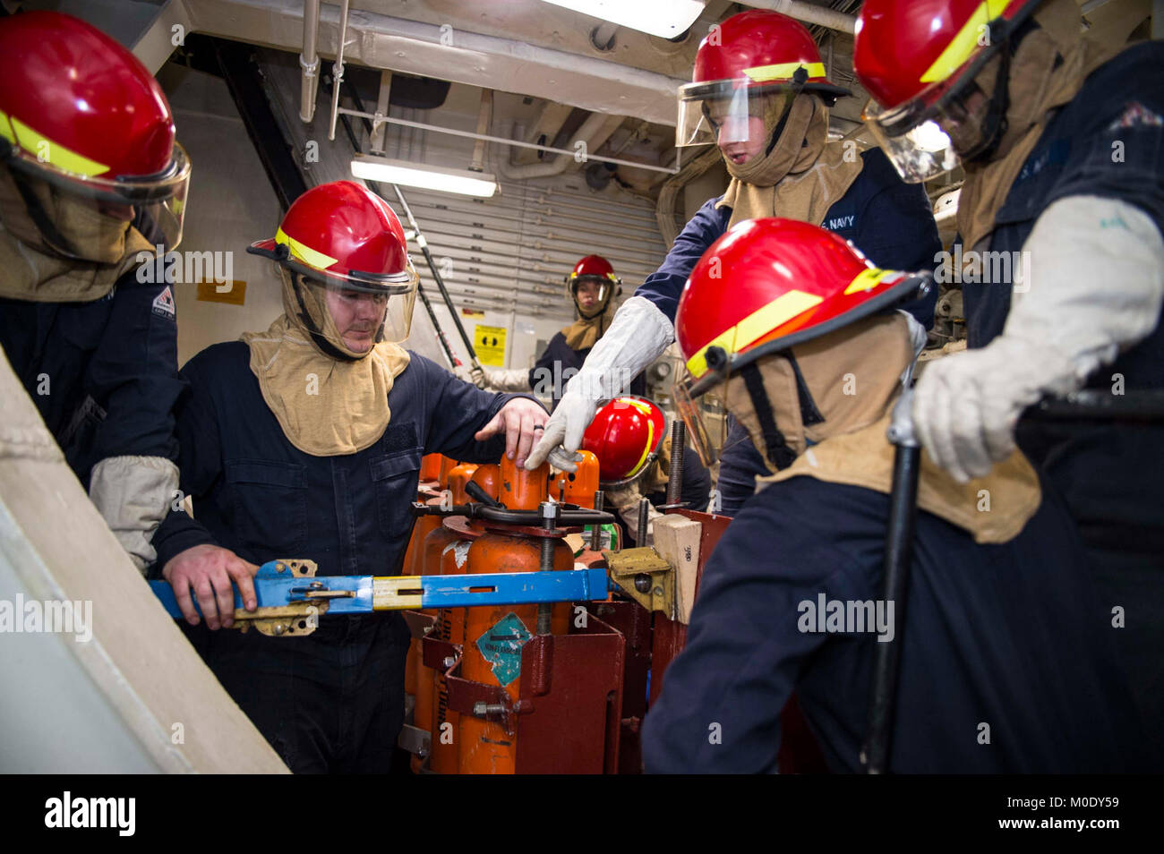 SASEBO, Japan (Jan. 17, 2018) Sailors place metal shoring on a bulkhead ...
