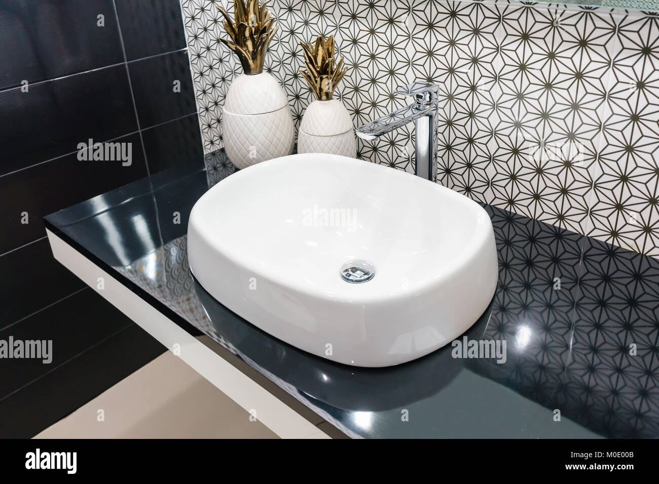 Interior of bathroom with sink basin faucet and mirror. Modern design ...