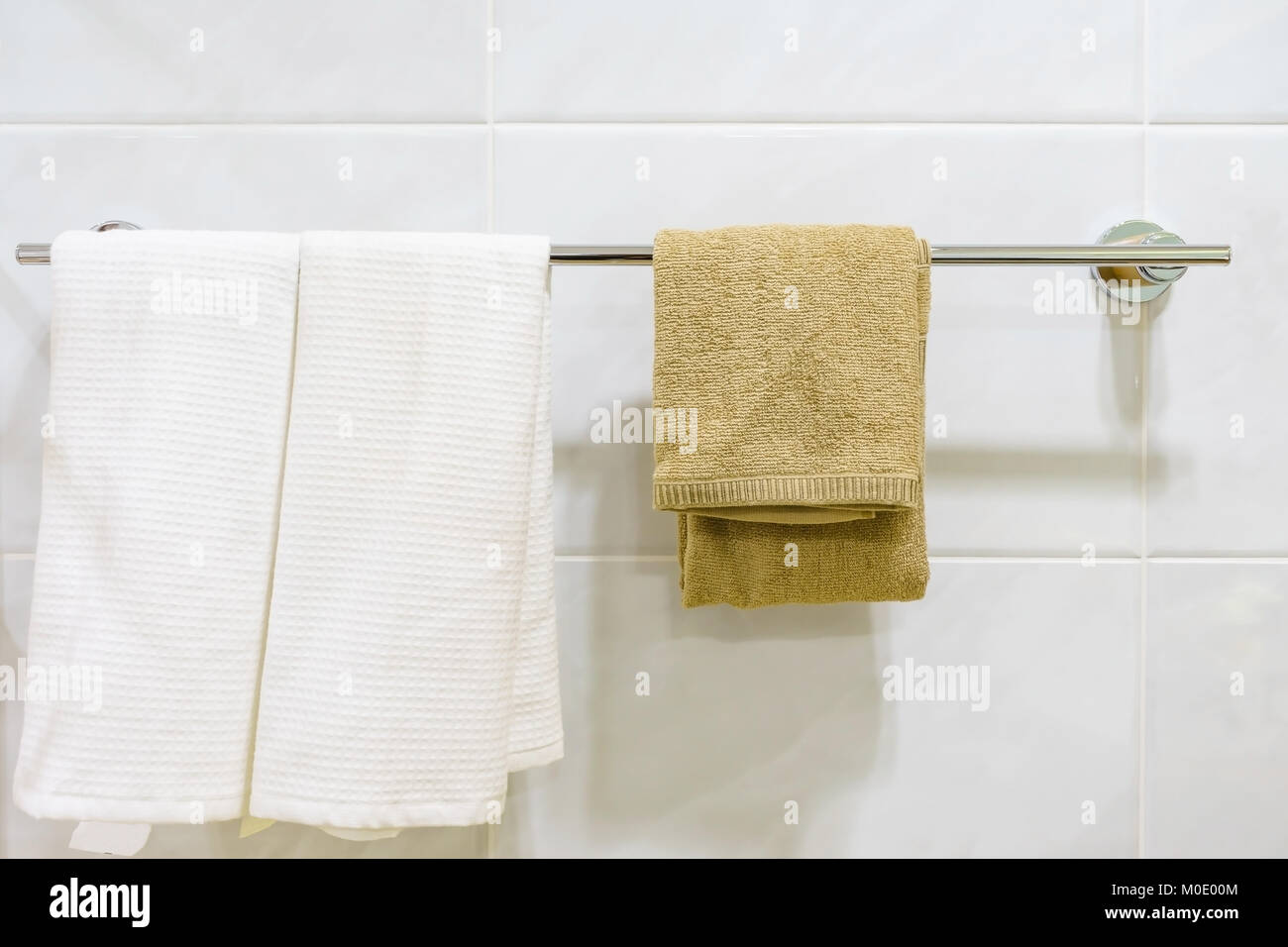 Bathroom Towel - Clean white towel on a hanger prepared to use Stock ...