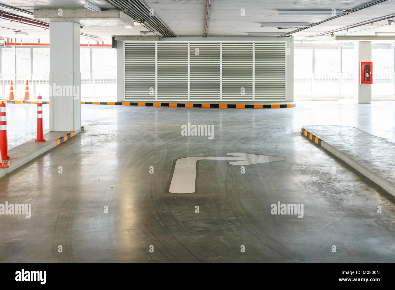 interior of parking garage with vacant parking lot in parking building ...