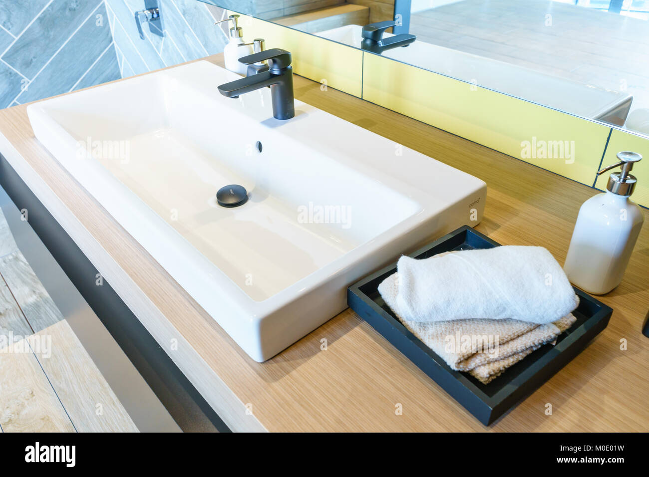 Interior of bathroom with sink basin faucet and mirror. Modern design ...