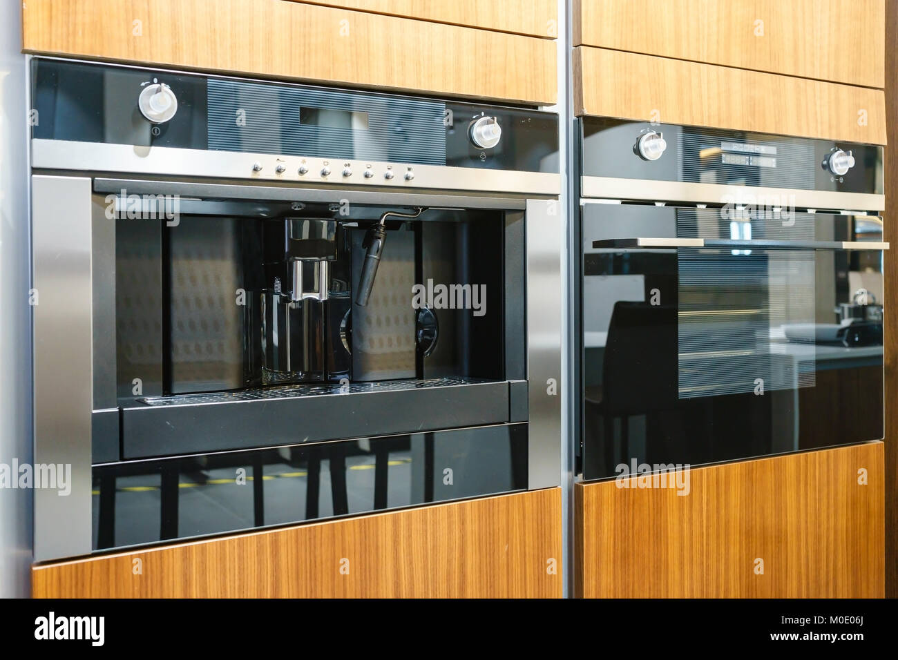Build in microwave oven in modern kitchen interior with hardwood ...