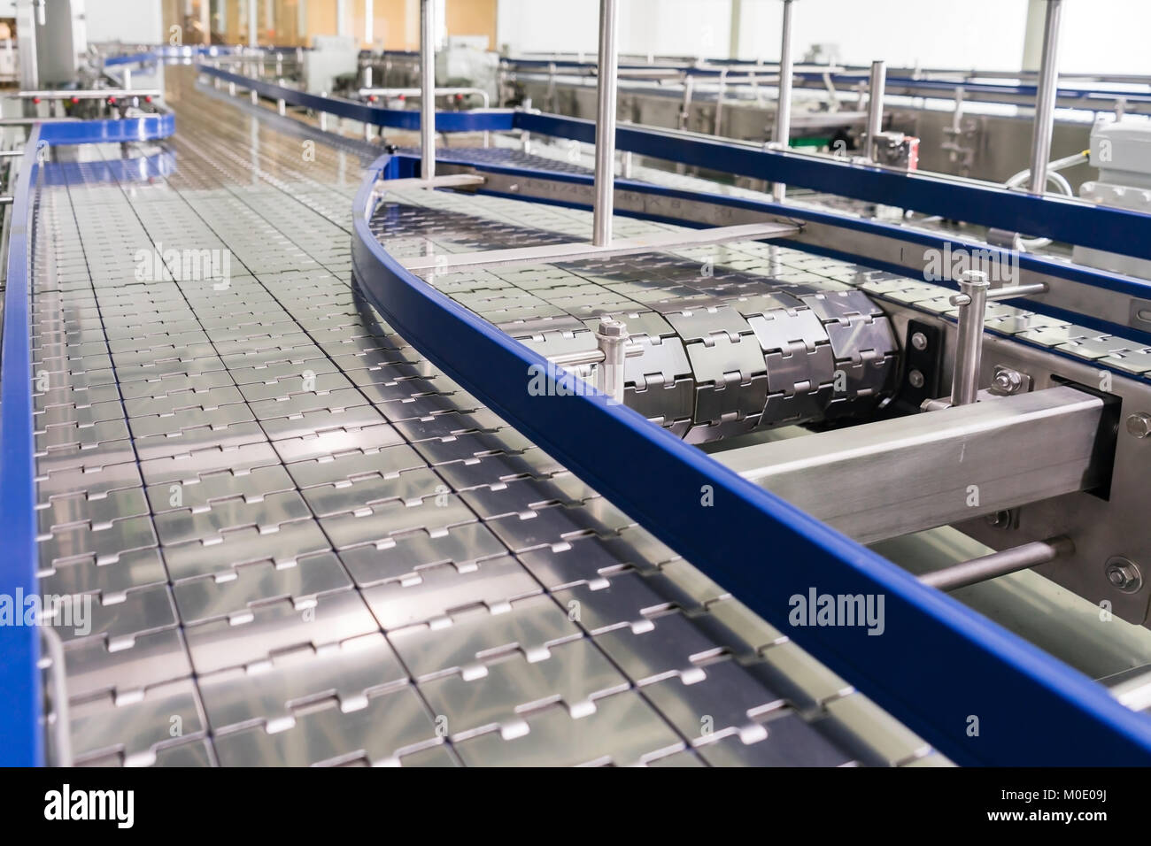 Steel conveyor for transportation of glass bottles. Belt and roller ...