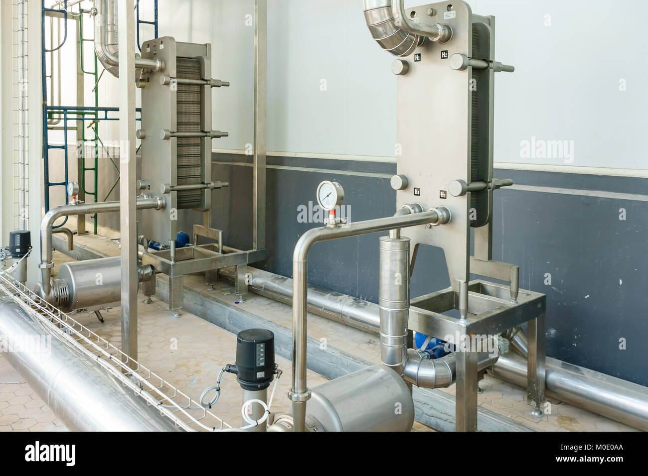 metallic plate in heat exchange machine and pump in the food industrial ...