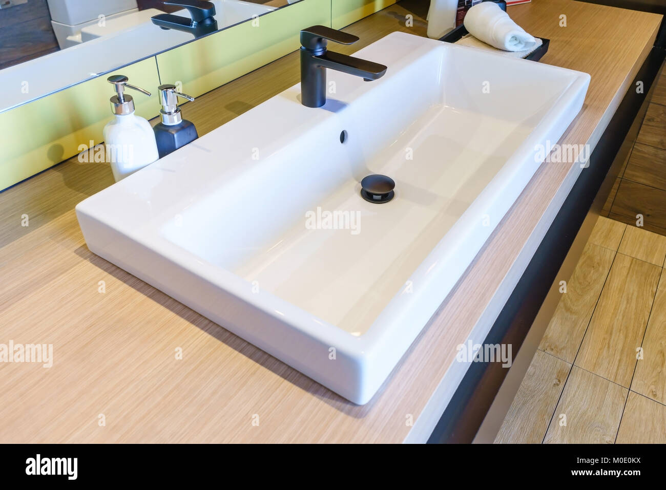 Interior of bathroom with sink basin faucet and mirror. Modern design ...