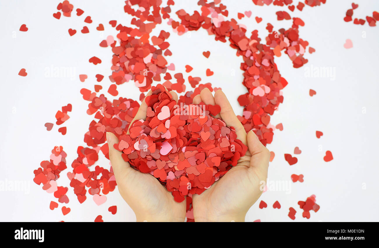Full of heart in cupped hands Stock Photo - Alamy
