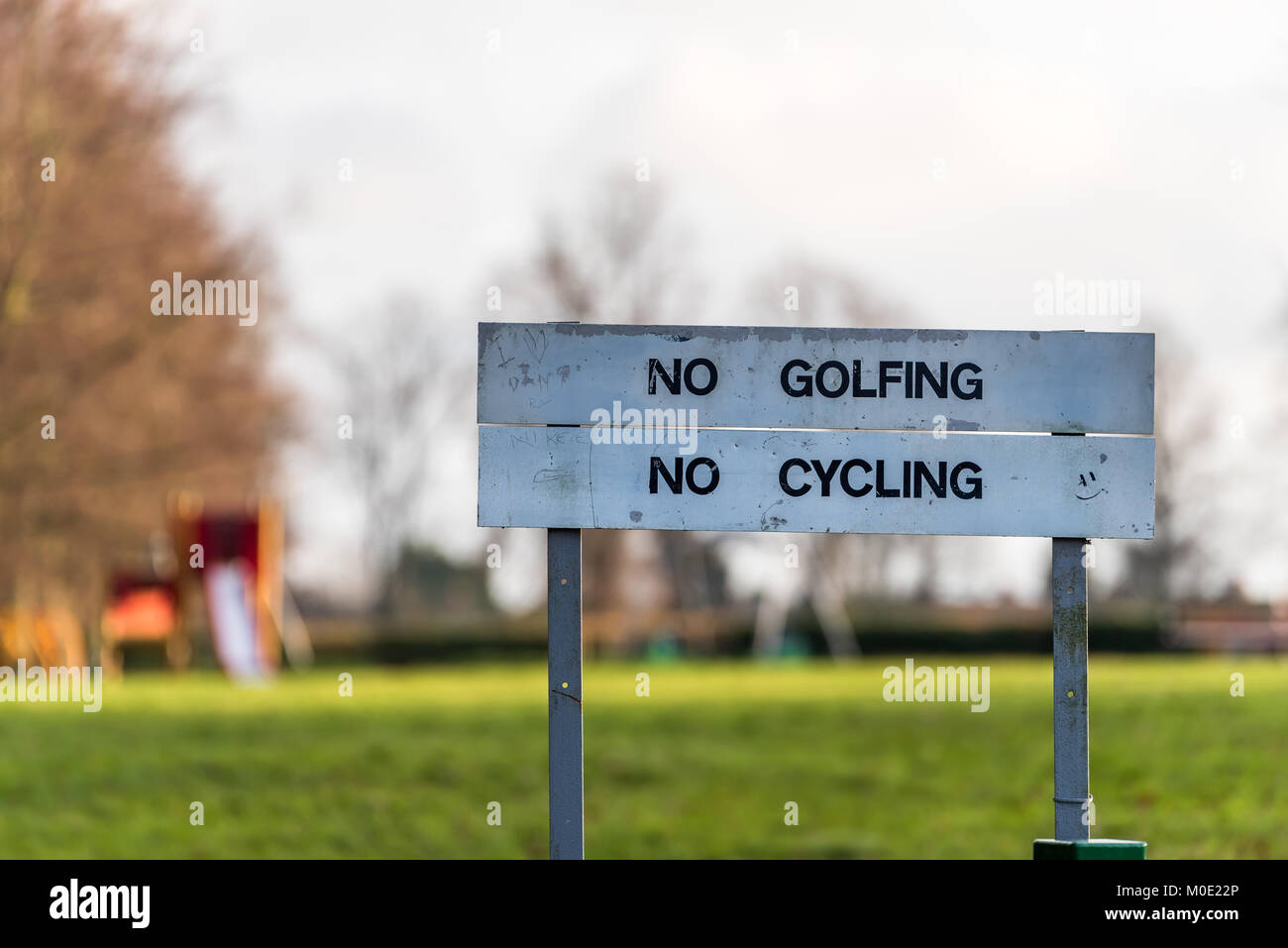 No Golfing and No Cycling sign post. Not allowed to play in this area ...