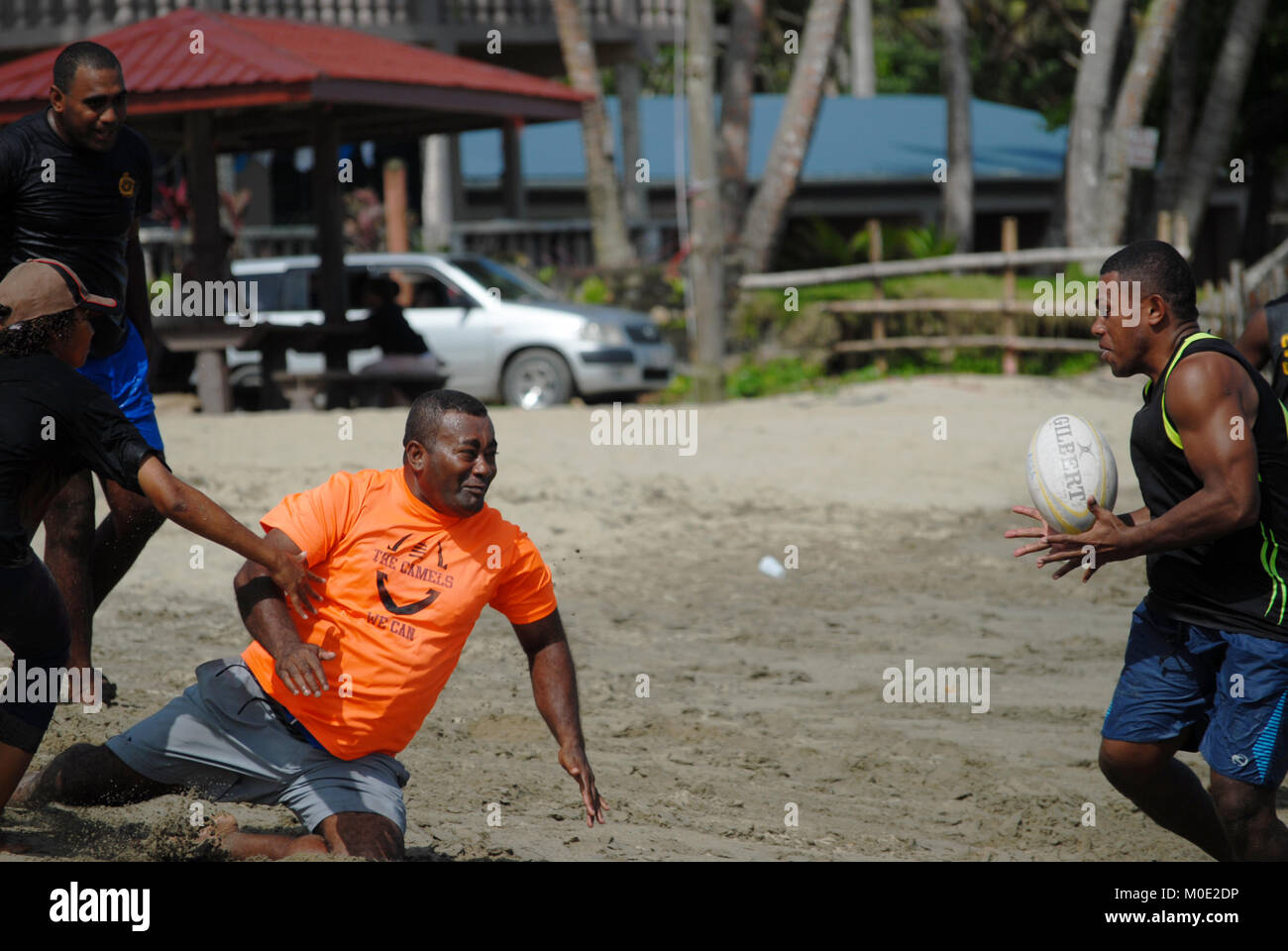 Fijian men playing rugby on Palm Beach, Pacific Harbour, Fiji Stock ...