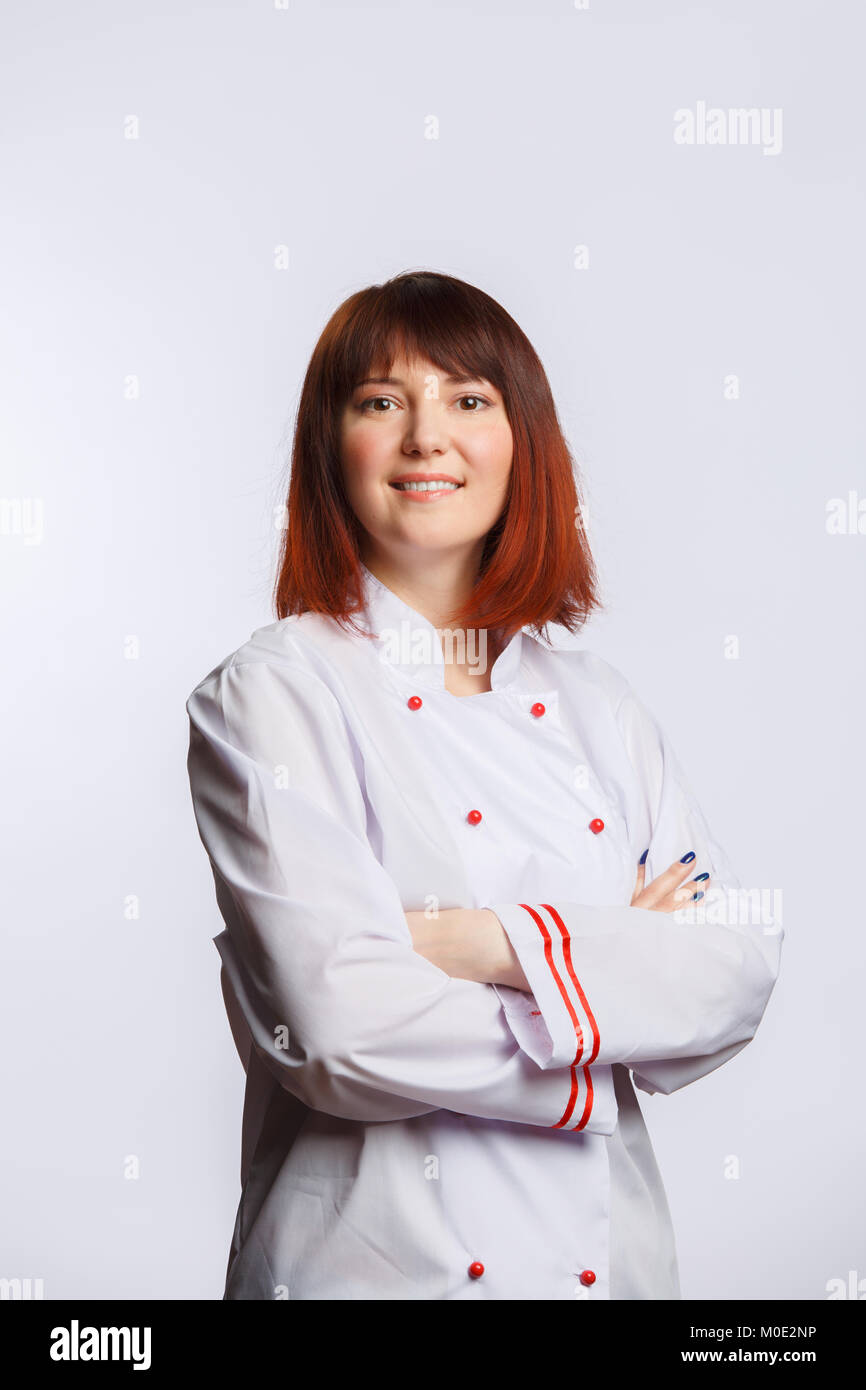 Female chef standing arms hi-res stock photography and images - Alamy