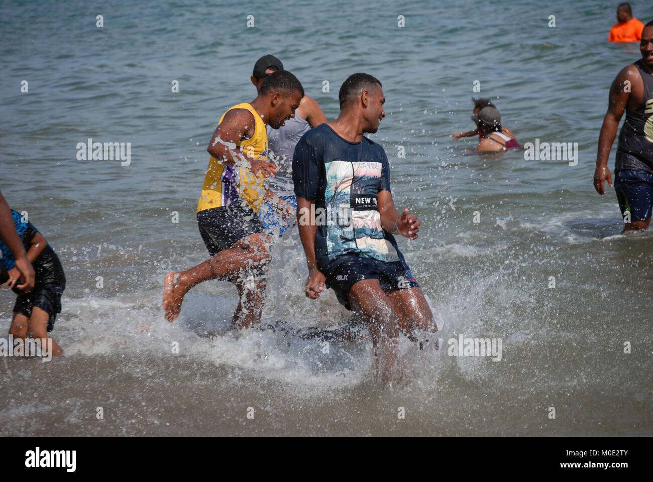 Fijian men playing rugby on Palm Beach, Pacific Harbour, Fiji Stock ...
