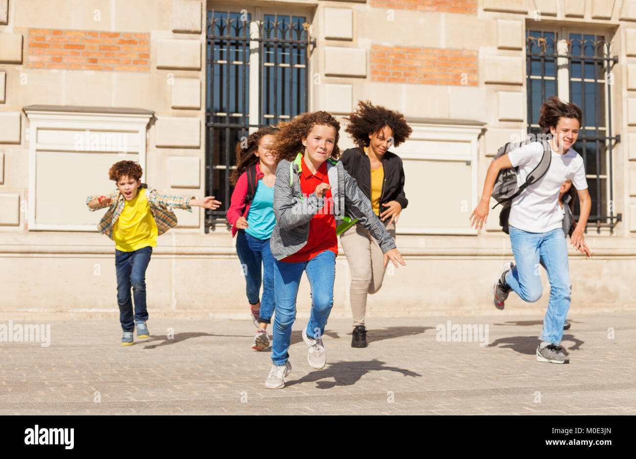 Children running school building hi-res stock photography and images ...