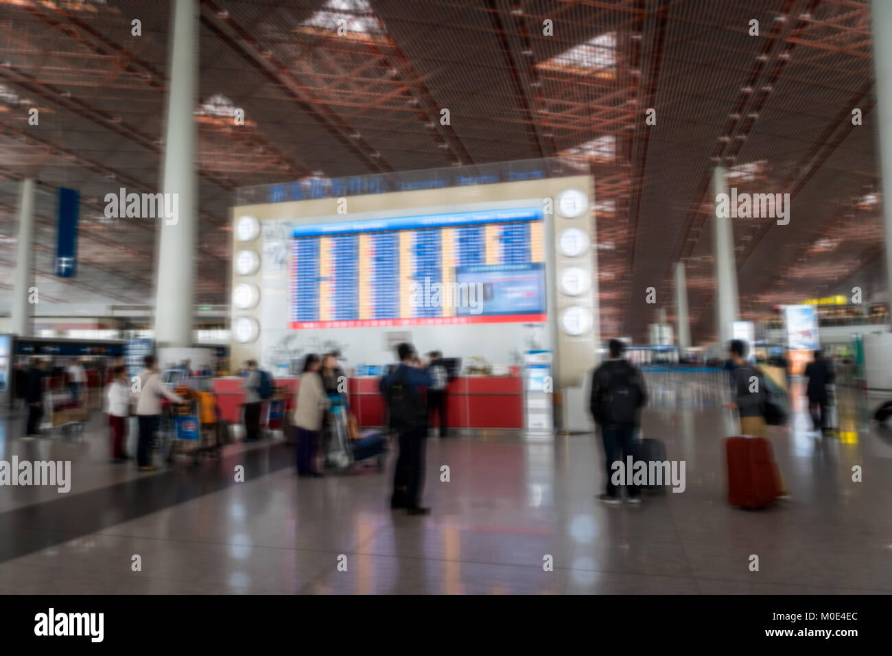Airport departure gate with passengers walking - blurred abstract photo ...