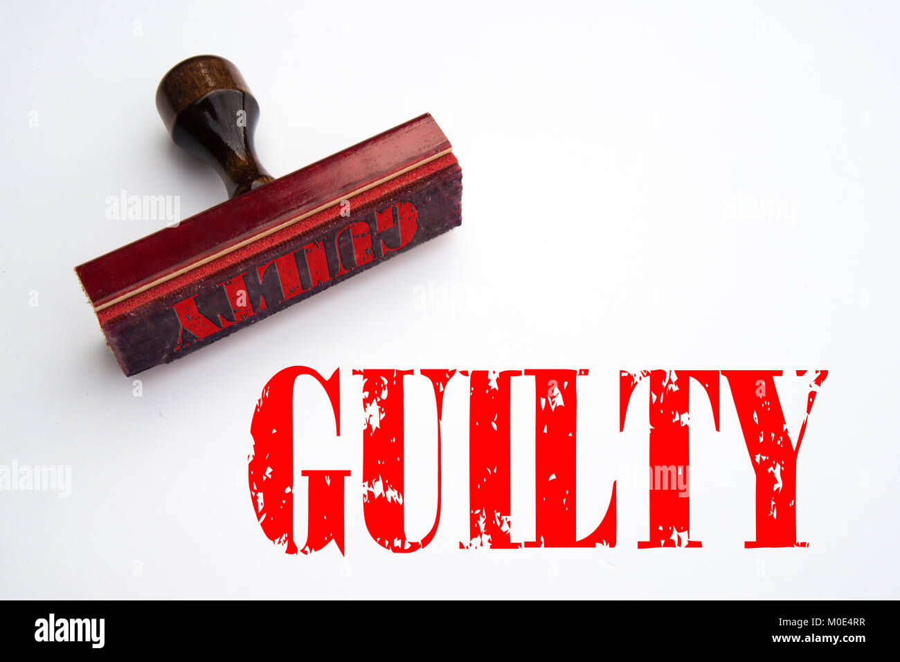 A rubber stamp with GUILTY Stock Photo - Alamy