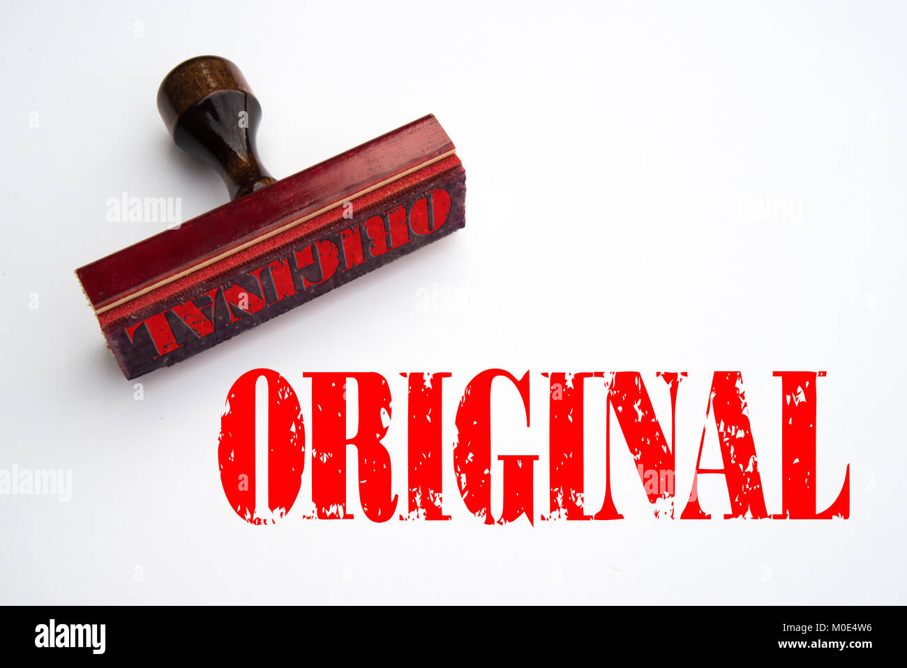 Rubber stamp and the word original Stock Photo - Alamy
